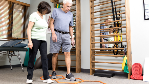 What is balance and how does it contribute to falls?